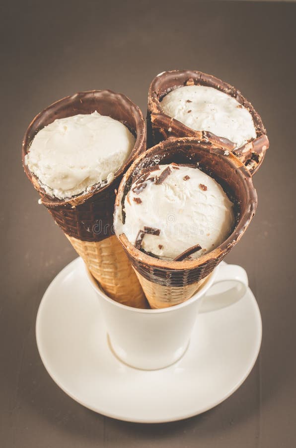 Three Ice Cream with Cone in Chocolate on a in a White Cup/three Ice ...