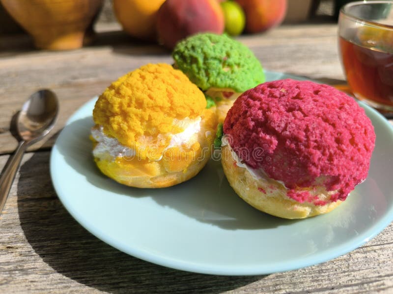 Three Iced Cakes on a Plate. Stock Image - Image of rustic ...