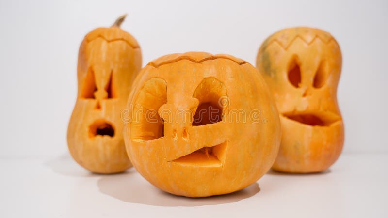 Three Jack-o-lantern on a White Background. Halloween Decoration. Stock ...
