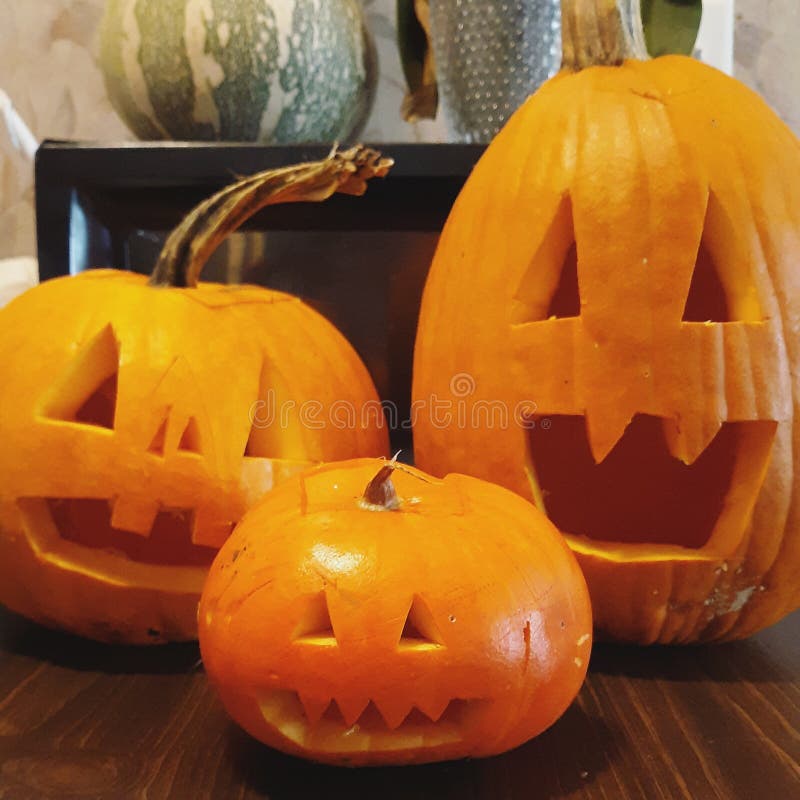 We Three Jack-o-lanterns stock photo. Image of jackolanterns - 162330762