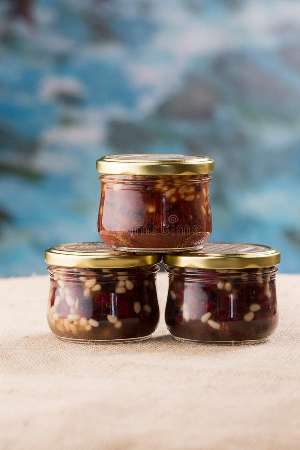 Three Jam Jars with Berries and Pine Nuts Stock Image - Image of jelly ...