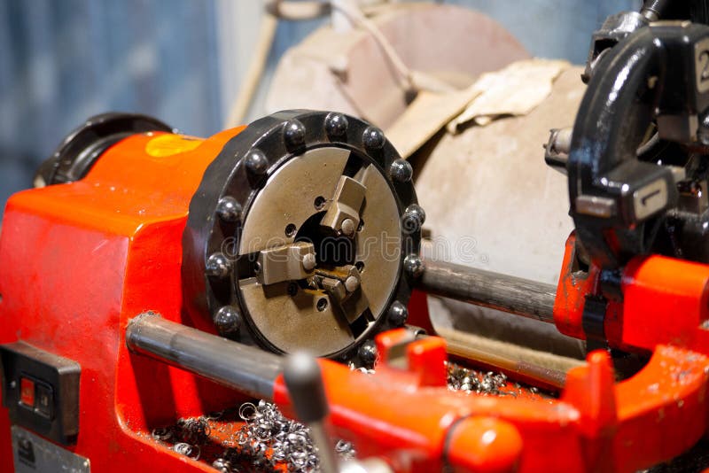 Three-jaw Lathe Chuck in Red Threading Machine Stock Image - Image of ...