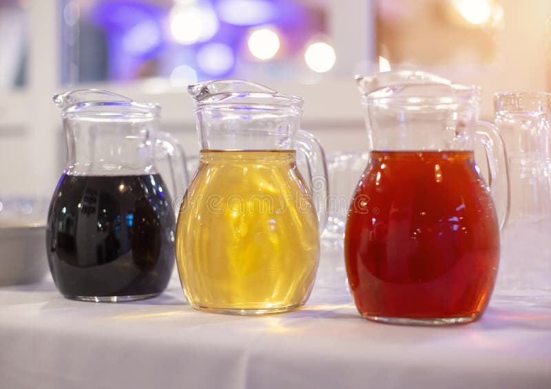 Three Jug Full of Different Drink Wine and Juice Stock Photo - Image of ...