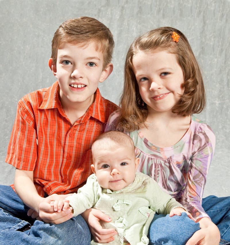 Three kids stock image. Image of pretty, sister, pose - 12830445