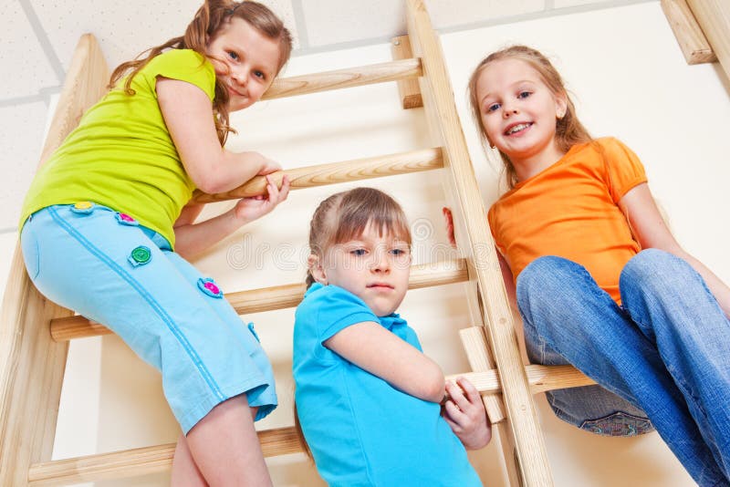 Three Kids in Bright Clothing Stock Image - Image of crowd, group: 24261865