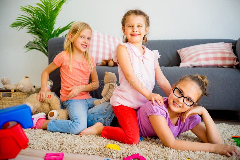 Three Kids in Elementary School Stock Photo - Image of brick, home ...