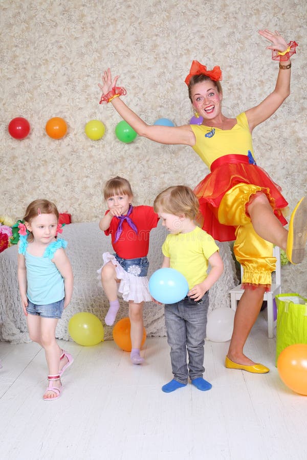 Three Kids and Holiday Representative Fun at Stock Photo - Image of ...