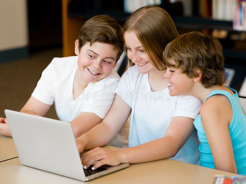 Three kids in library stock image. Image of girl, brother - 54870663
