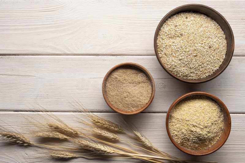 Three Kind of Bran in Bowl on a White Wooden Table Stock Photo - Image ...