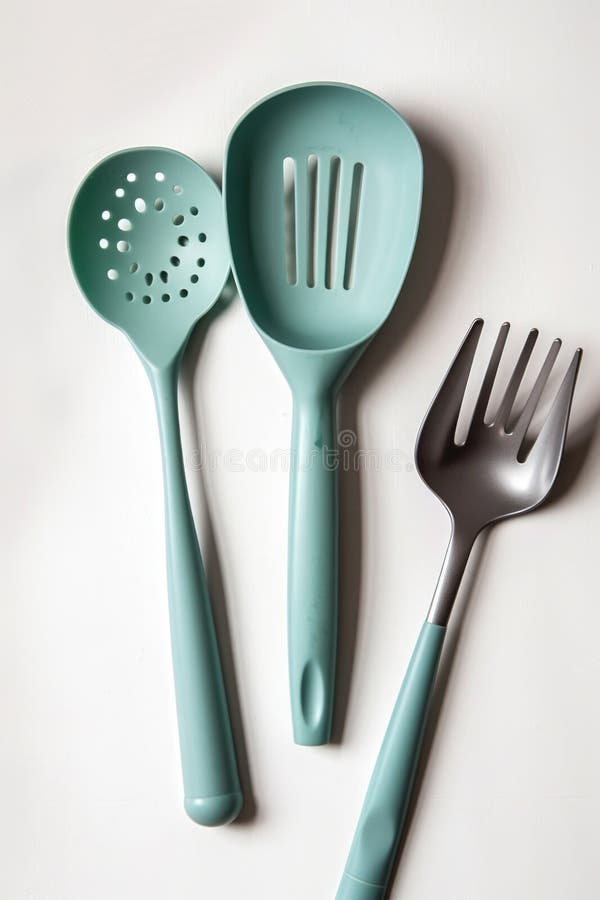Three Kitchen Utensils and a Spatula on a Table, Perfect for Food ...