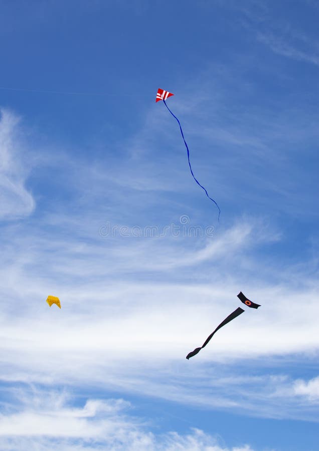 Three kites in sky stock photo. Image of motion, high - 12453212