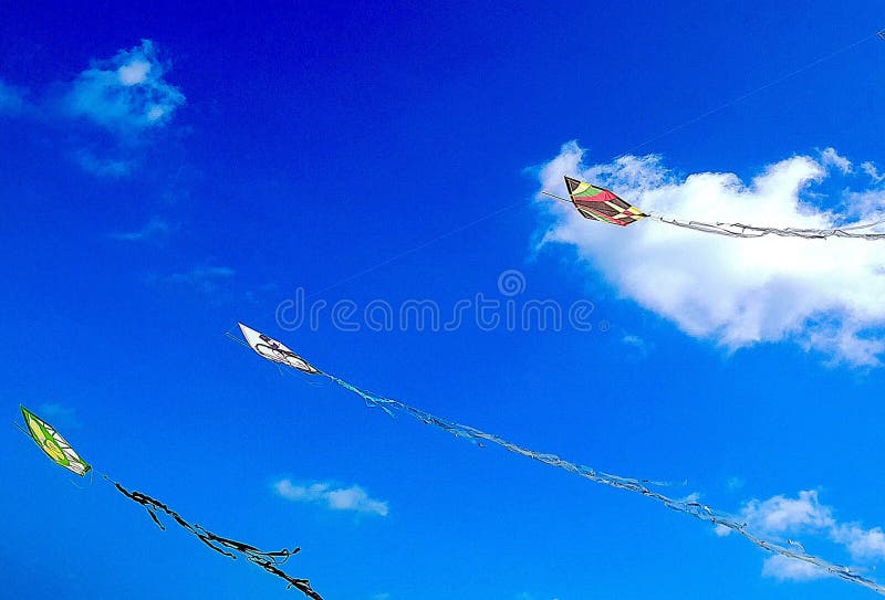 Three kites in the sky stock image. Image of weekend - 312388043