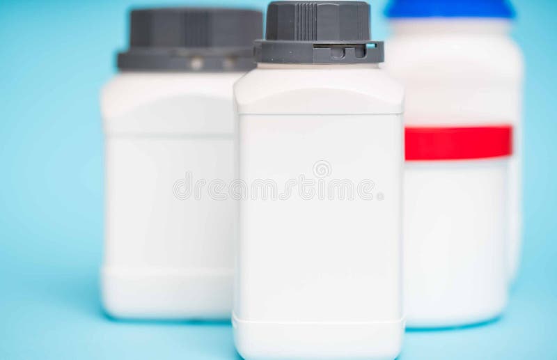 Three Laboratory Bottles stock photo. Image of handling - 333184094