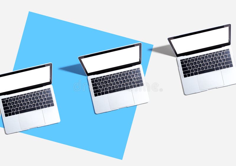 Three Laptop Computers with Shadow Stock Image - Image of online ...