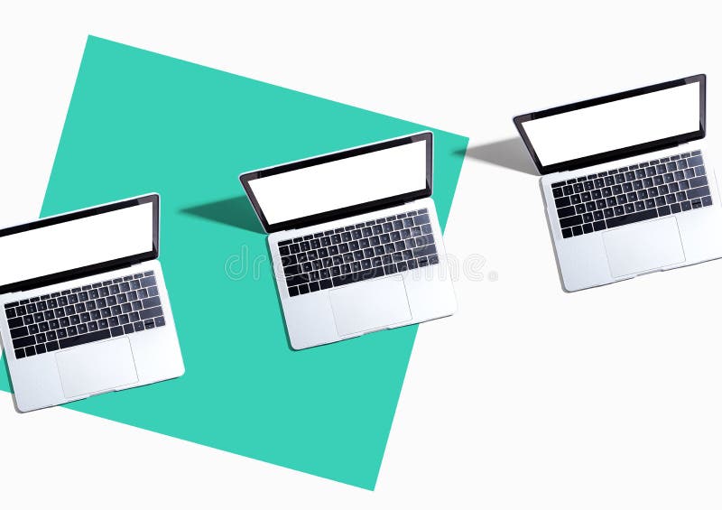 Three Laptop Computers with Shadow Stock Photo - Image of meeting ...