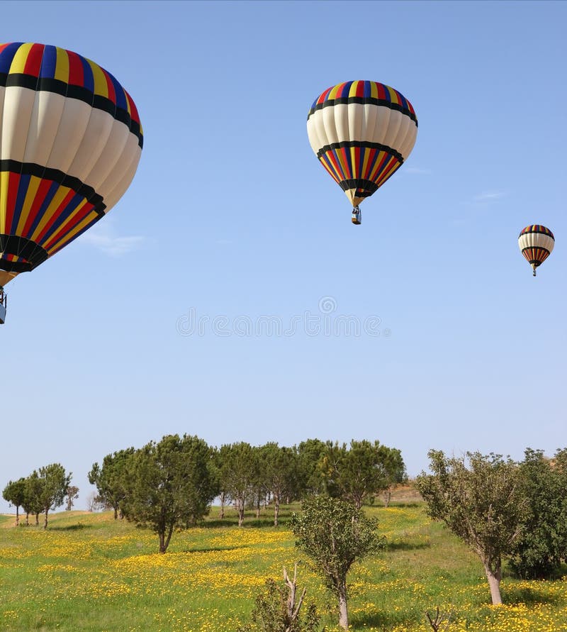 Three Balloons Flying Over the Field Stock Photo - Image of season ...