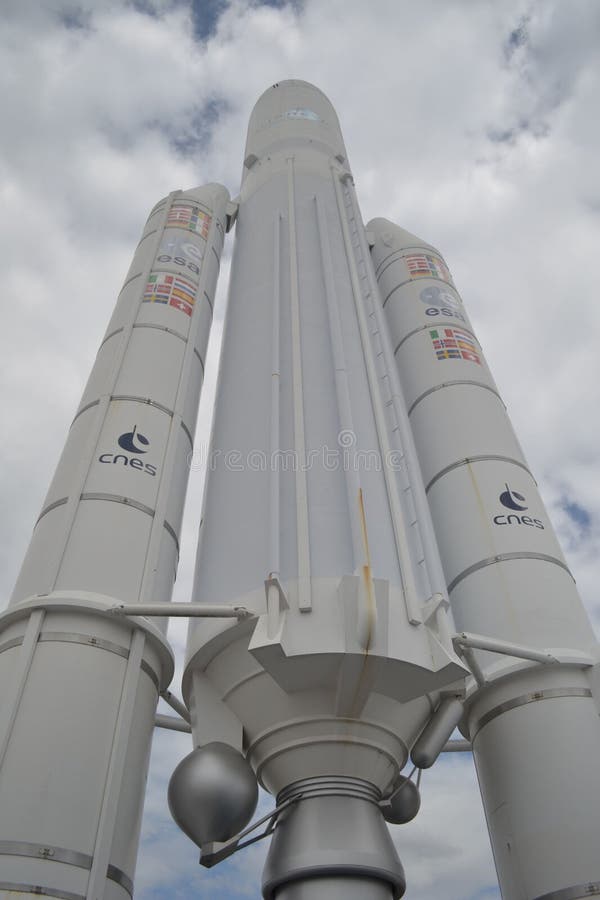 Three Large Rockets Sitting Side by Side on Top of a Tower Editorial ...