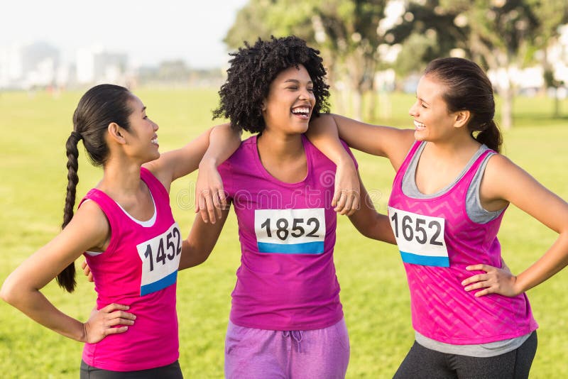 Three Laughing Runners Supporting Breast Cancer Marathon Stock Photo ...