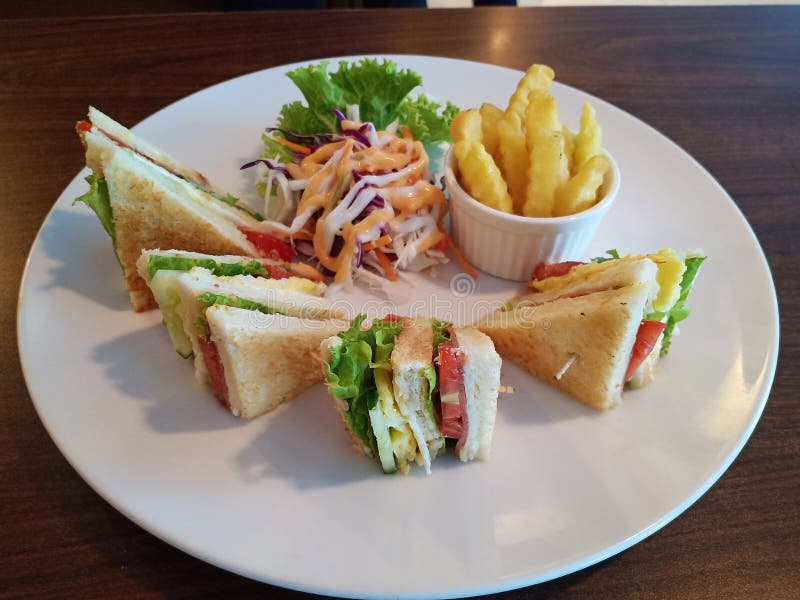 Three Layer Sandwich Potato Fries and Coselow Salad Stock Photo - Image ...
