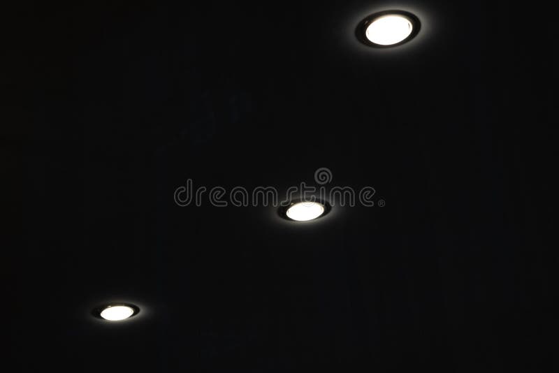 Three LED Small Lights on Ceiling in Dark Stock Image - Image of rich ...
