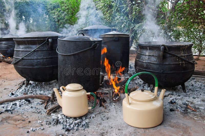 Three Legged Pots Cauldron and Teapots on the Fire Cooking Outdoors in ...