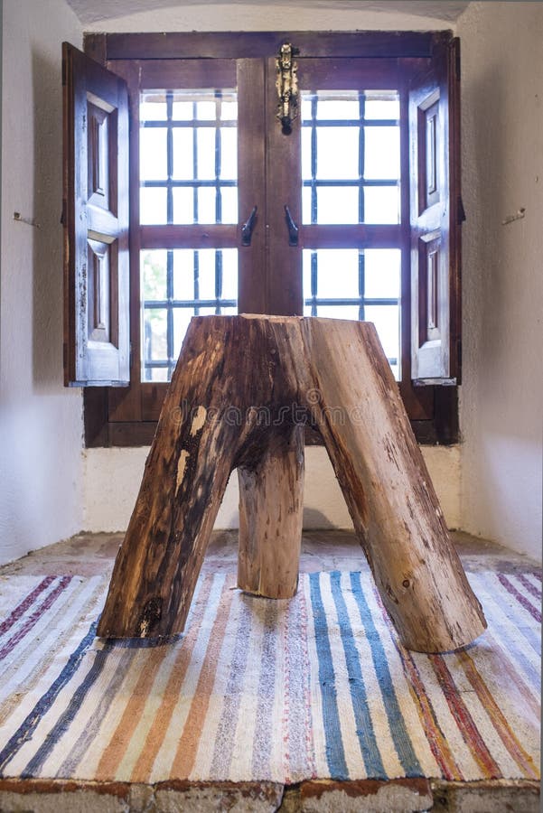 Three Legs Stump Stool Made with Tree Trunk and Main Branches Stock ...