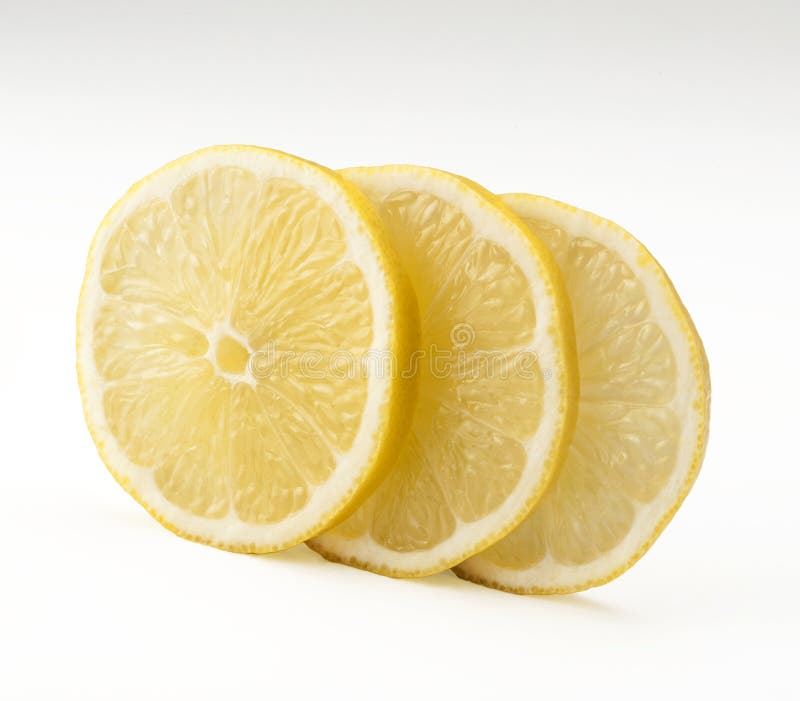 Three Lemon Slices in Vertical Position on White Background Stock Image ...