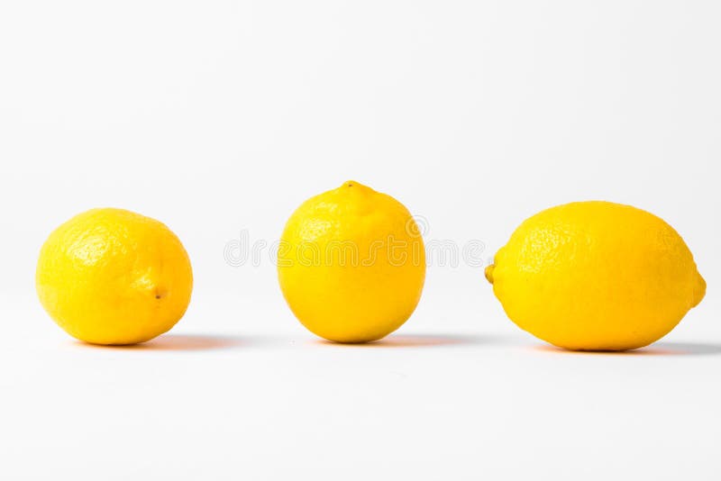 Portrait of Three Lemons in a Row Stock Photo - Image of diet, shot ...