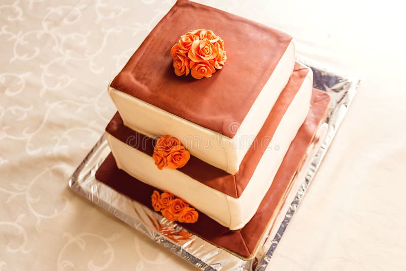 Three-level chocolate cake stock image. Image of layer - 144582201