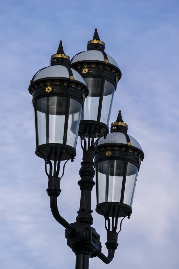 Three street lights stock image. Image of london, post - 59567387