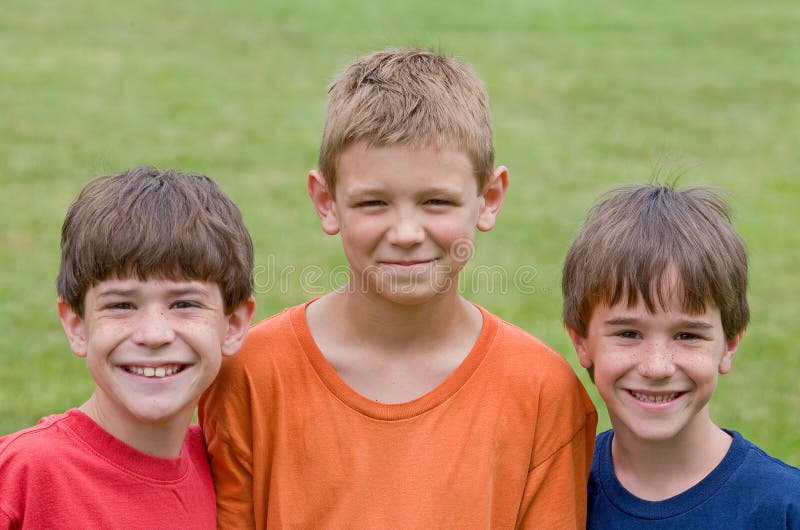 Two Little Boys Playing in Wheelbarrow at the Pumpkin Patch Stock Photo ...