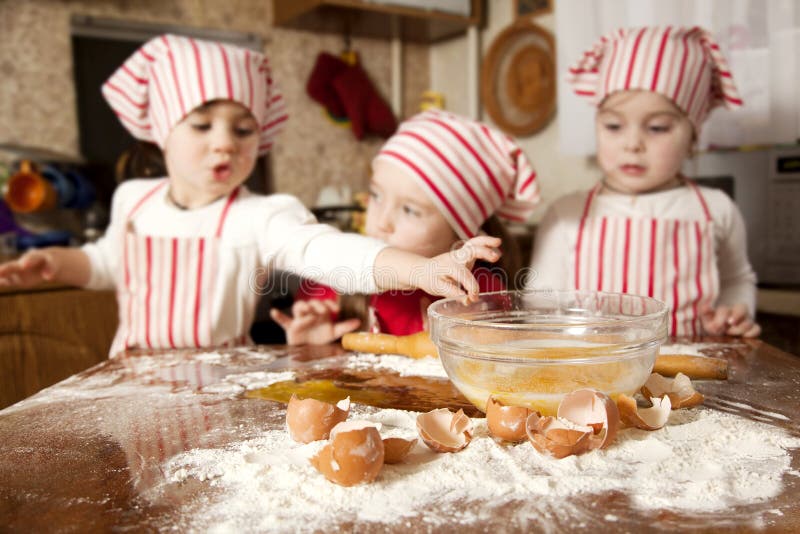 Three Little Chefs in the Kitchen Stock Photo - Image of horizontal ...