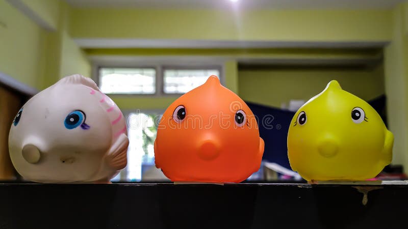Three Little Cute Plastic Fish Toy Stock Photo - Image of plastic, fish ...