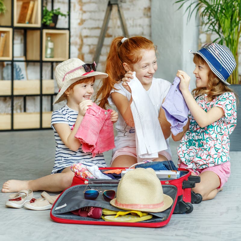 216 Girls Packing Clothes Stock Photos - Free & Royalty-Free Stock ...