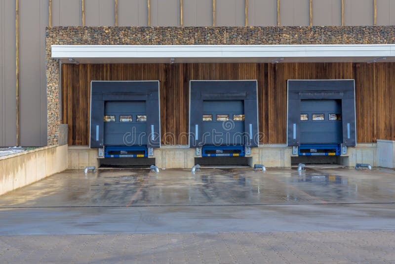 Three loading docks stock image. Image of exterior, factory - 89660435