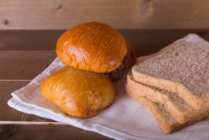 Three Loaf Bread and Whole Wheat Breads on Linen Stock Photo - Image of ...