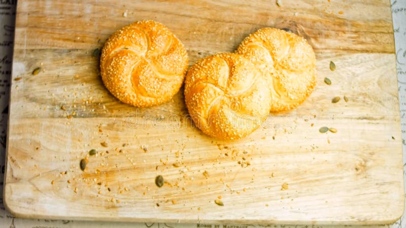 Three Loaves of Freshly Baked Bread in a Round Shape. in the Background ...