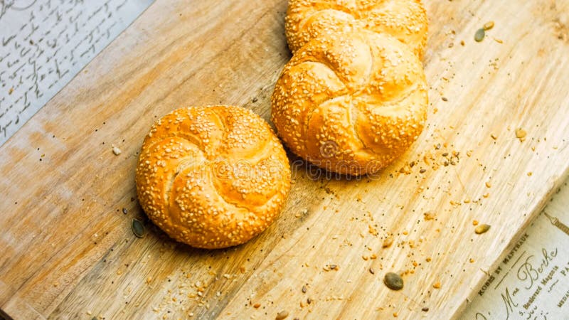 Three Loaves of Freshly Baked Bread in a Round Shape. in the Background ...