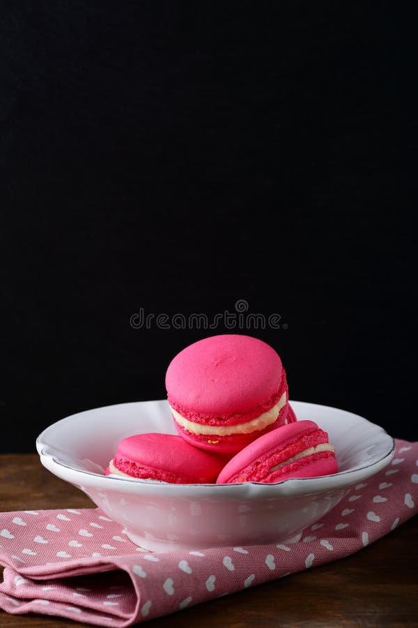 Three macaroon in a plate stock image. Image of cuisine - 65280453