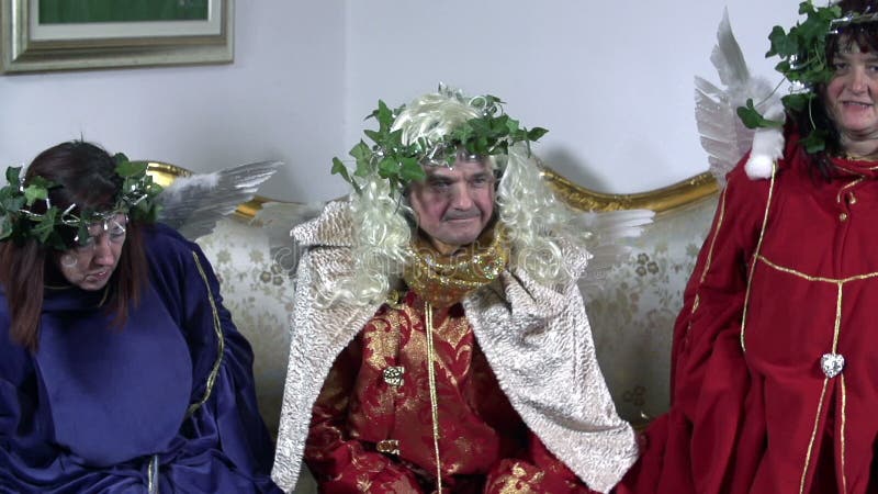 Three Male Angels Turn Around and Sit Down Stock Footage - Video of ...