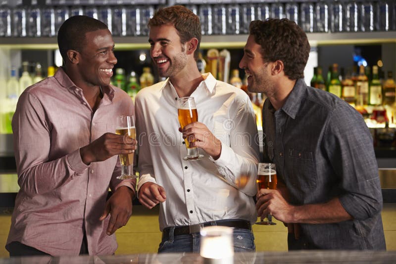 Three Male Friends Drinking Beer Outdoor Terrace Stock Photo - Image of ...