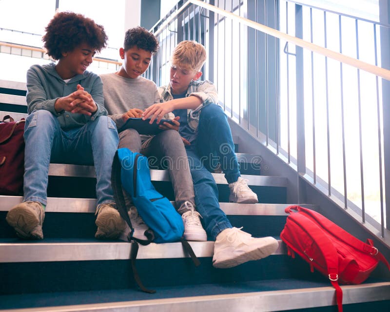 Three Male Secondary or High School Pupils Inside School Building on ...