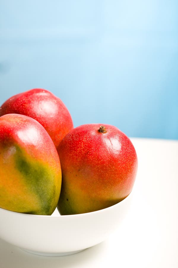Three Mangoes stock image. Image of three, porcelain, food - 6779211