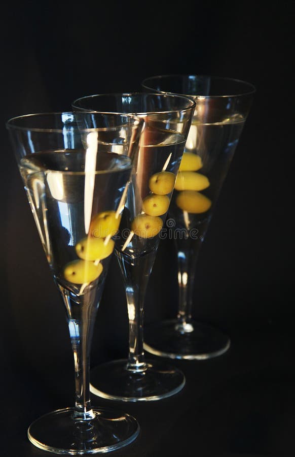 Three martini cocktails stock photo. Image of studio - 56934894