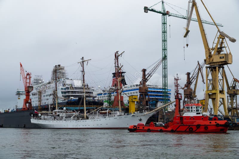 A Three-masted Sailing Ship Under Repair in a Shipyard Stock Photo ...
