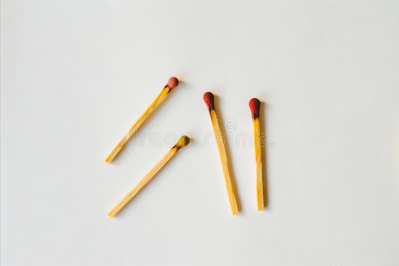 Three Matches are Lined Up in a Row on a White Surface Stock Photo ...