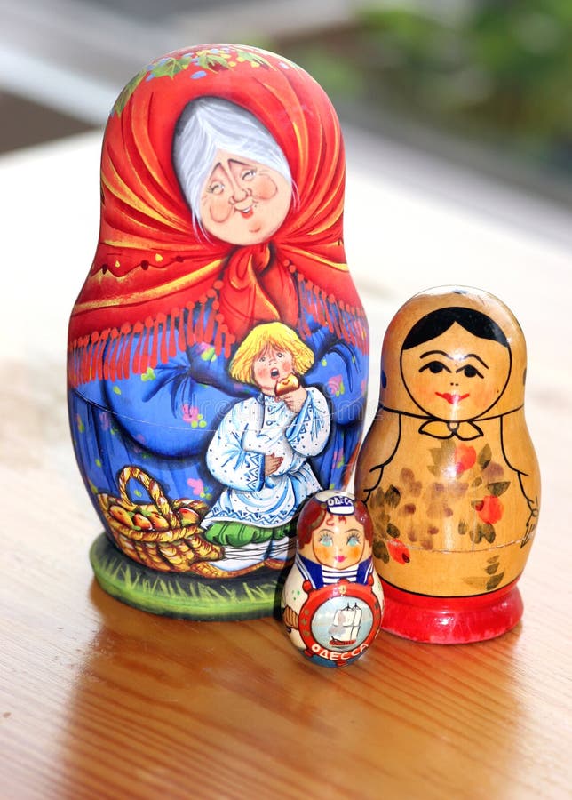 Three matrioshkas stock image. Image of hand, bundle, babushka - 930649