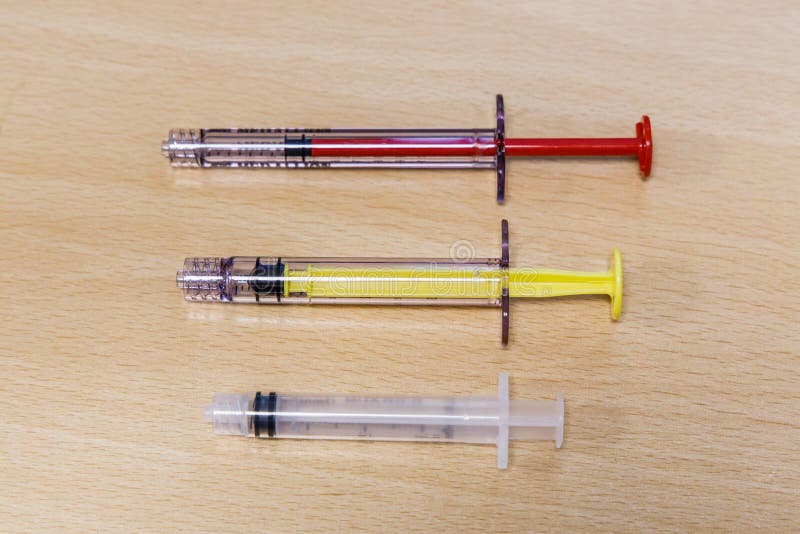 Syringes Of Different Colors Stock Photo - Image of healthcare ...