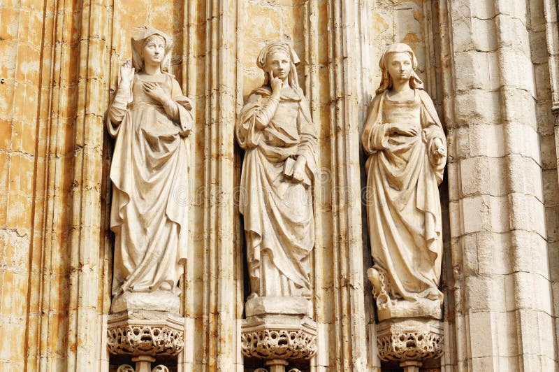 Three Medieval Statues of Women Stock Photo - Image of dress, belgium ...