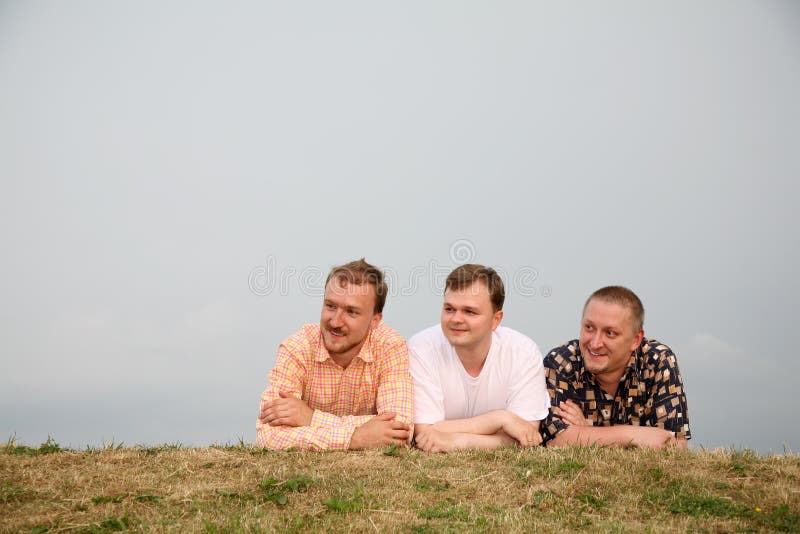 Three men stock image. Image of meadow, life, face, pleasure - 2793723